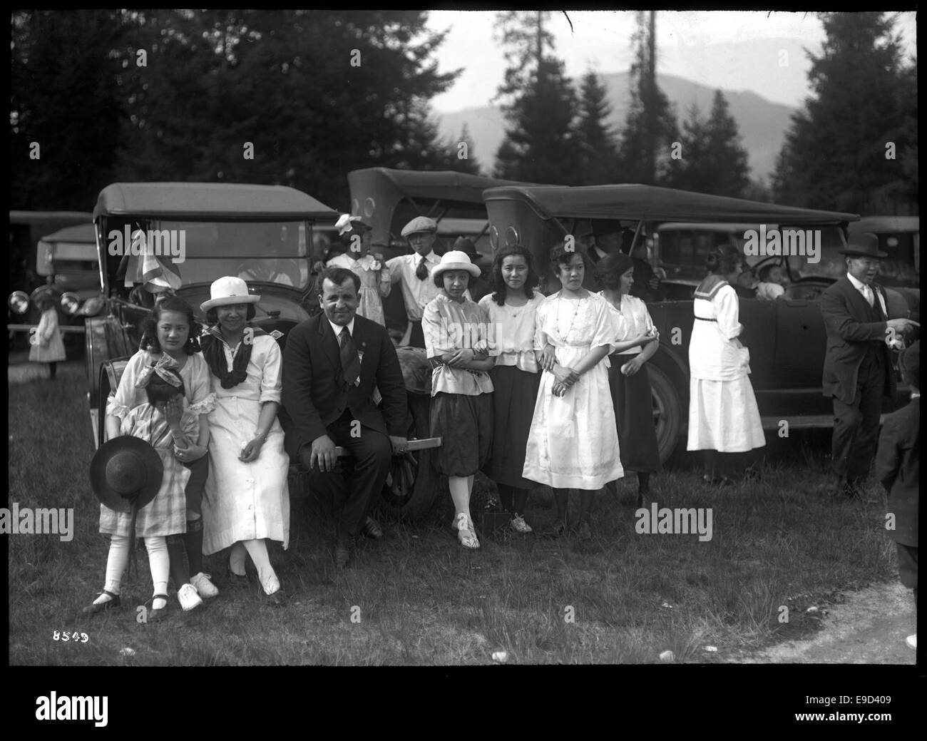 A photograph capturing an automobile rally during a Chinese Convention ...
