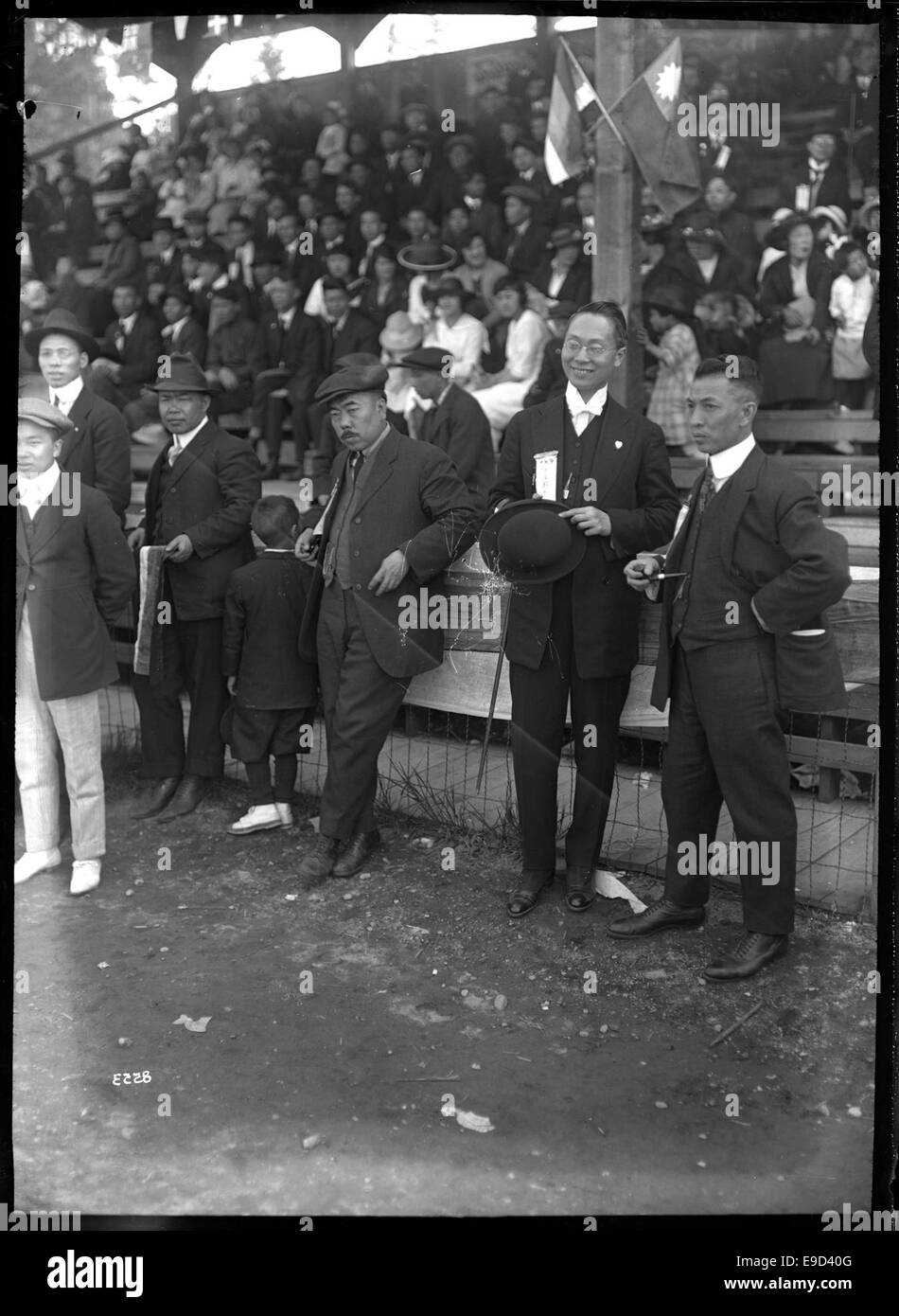 This photograph shows men attending a Chinese convention, likely a ...