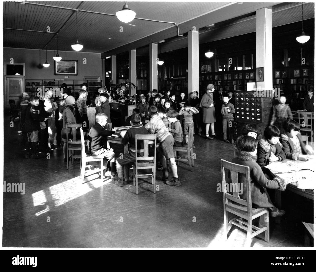 This photograph shows a group of children gathered at the Kitsilano ...