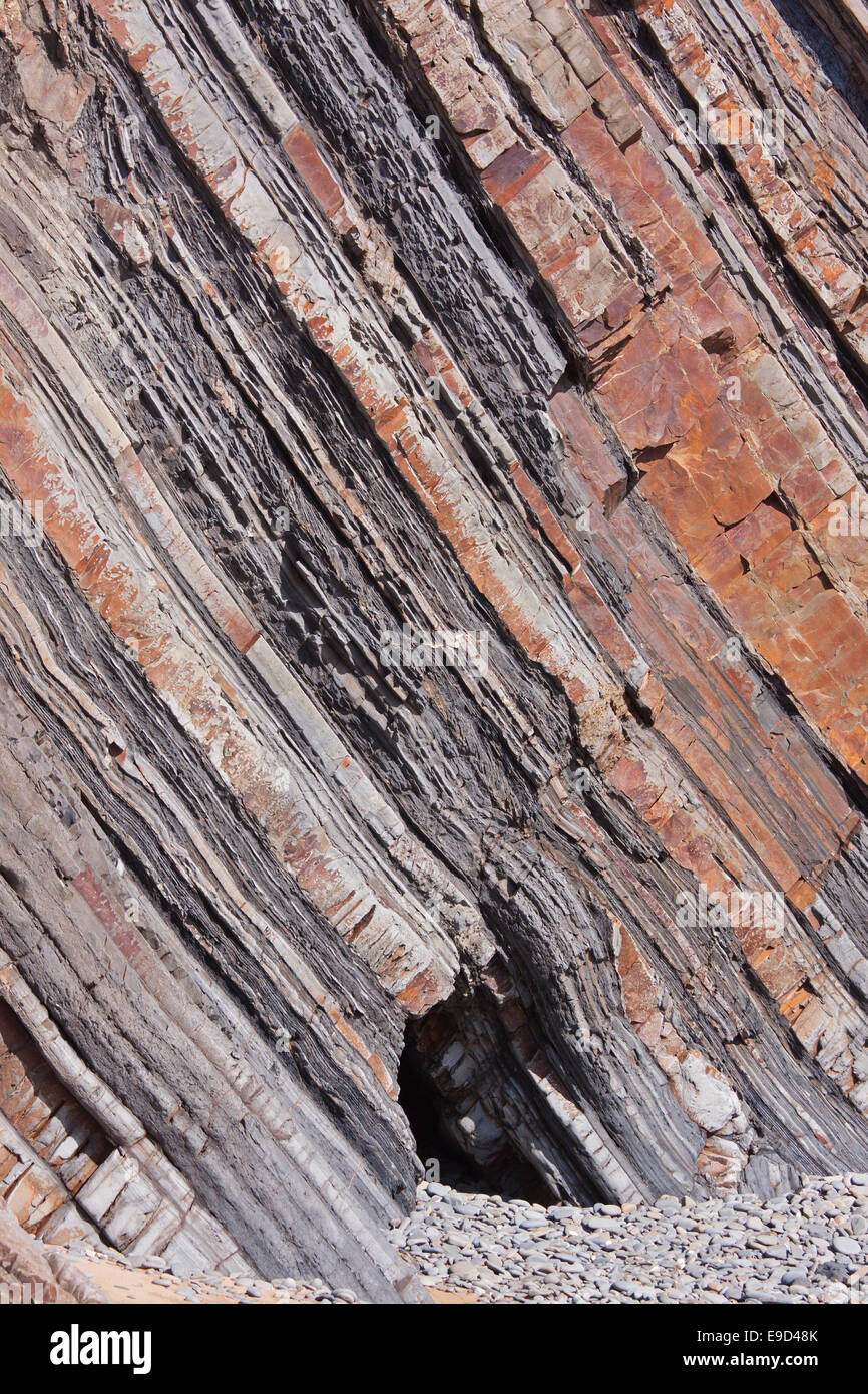 Cliff face housing a small cave located on the North Cornish coast ...