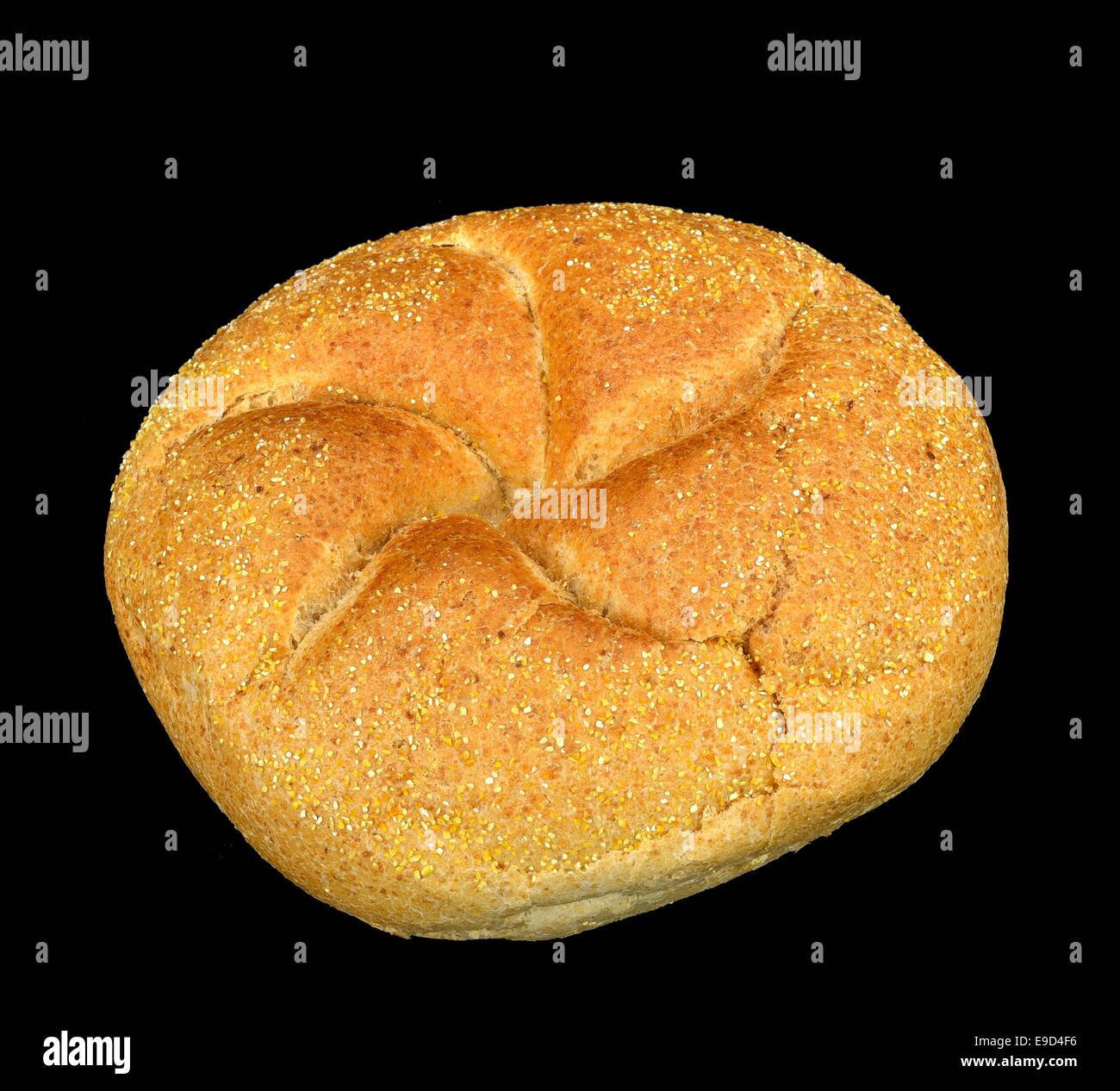 Whole wheat kaiser roll on a black background Stock Photo - Alamy