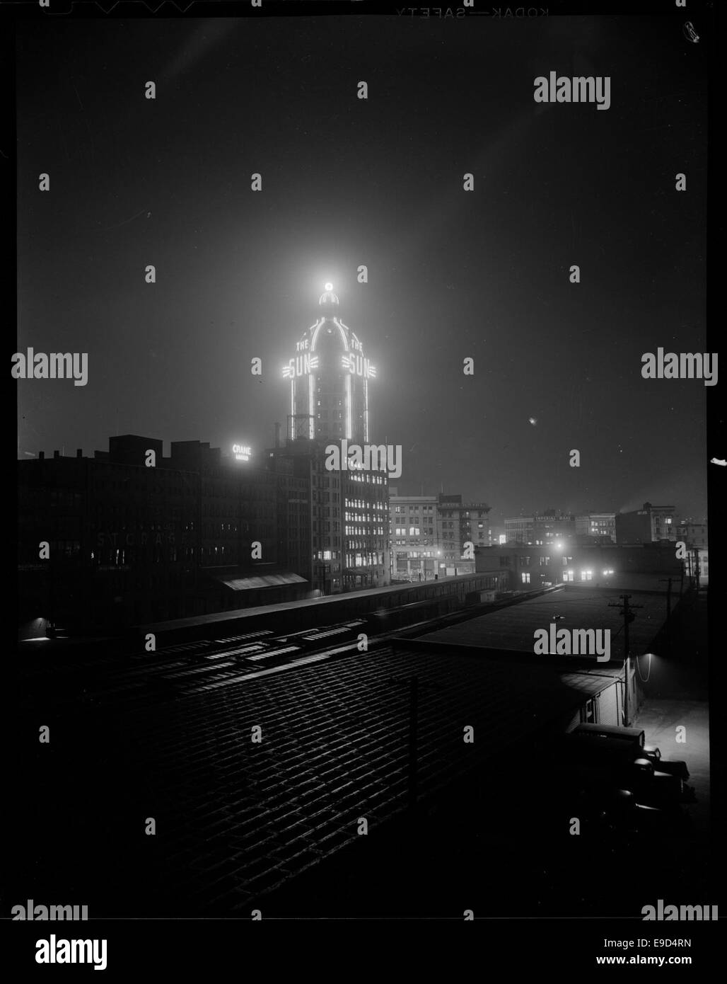 This photograph showcases the Sun Building, a historical structure. The ...