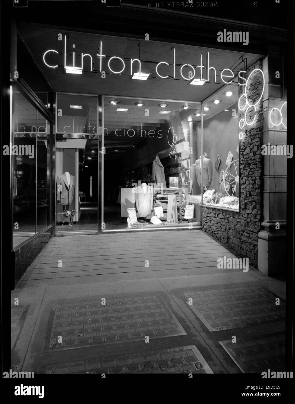 This photograph shows a Clinton Clothes store, capturing its exterior ...