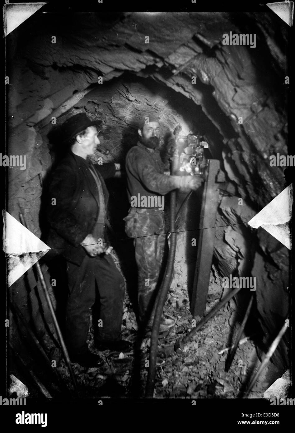 Photograph of two miners drilling inside the Nettie L mine in Ferguson ...
