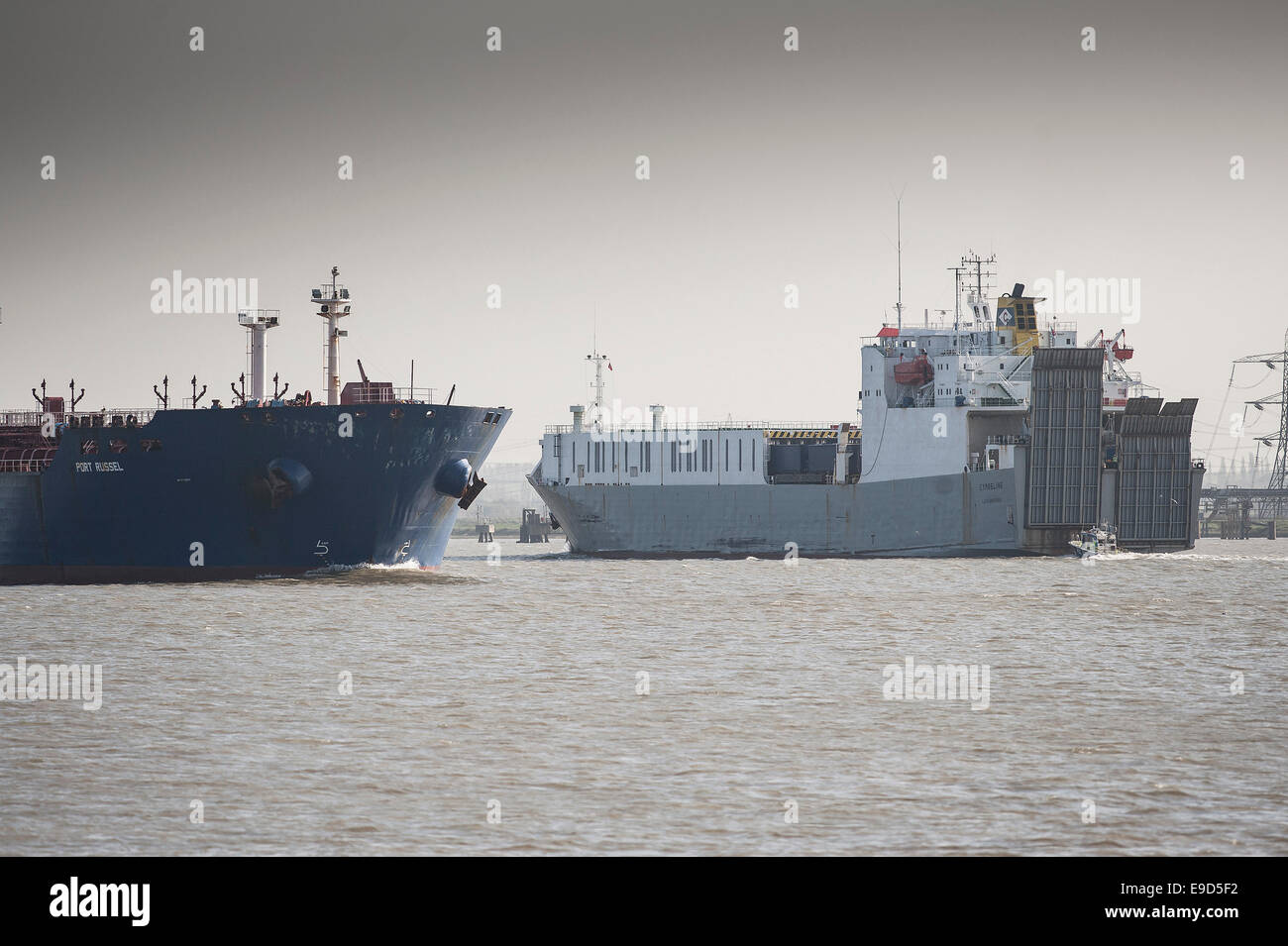 Two cargo ships passing on the River Thames Stock Photo - Alamy