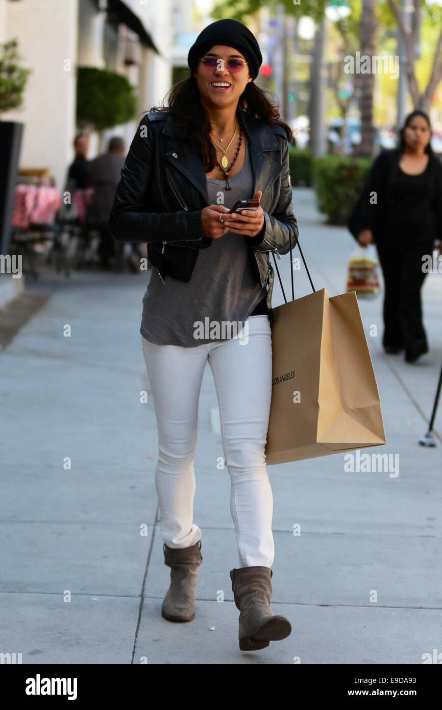 Michelle Rodriguez shops at James Pearce. Featuring: Michelle Rodriguez ...
