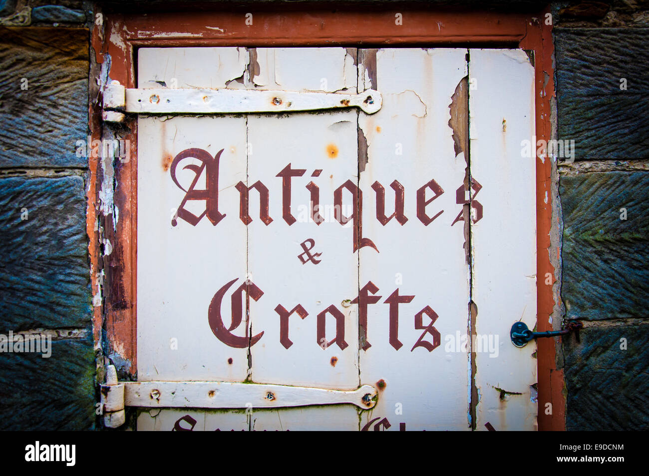 Old wooden Obsolete sign with Antiques and Crafts Stock Photo - Alamy