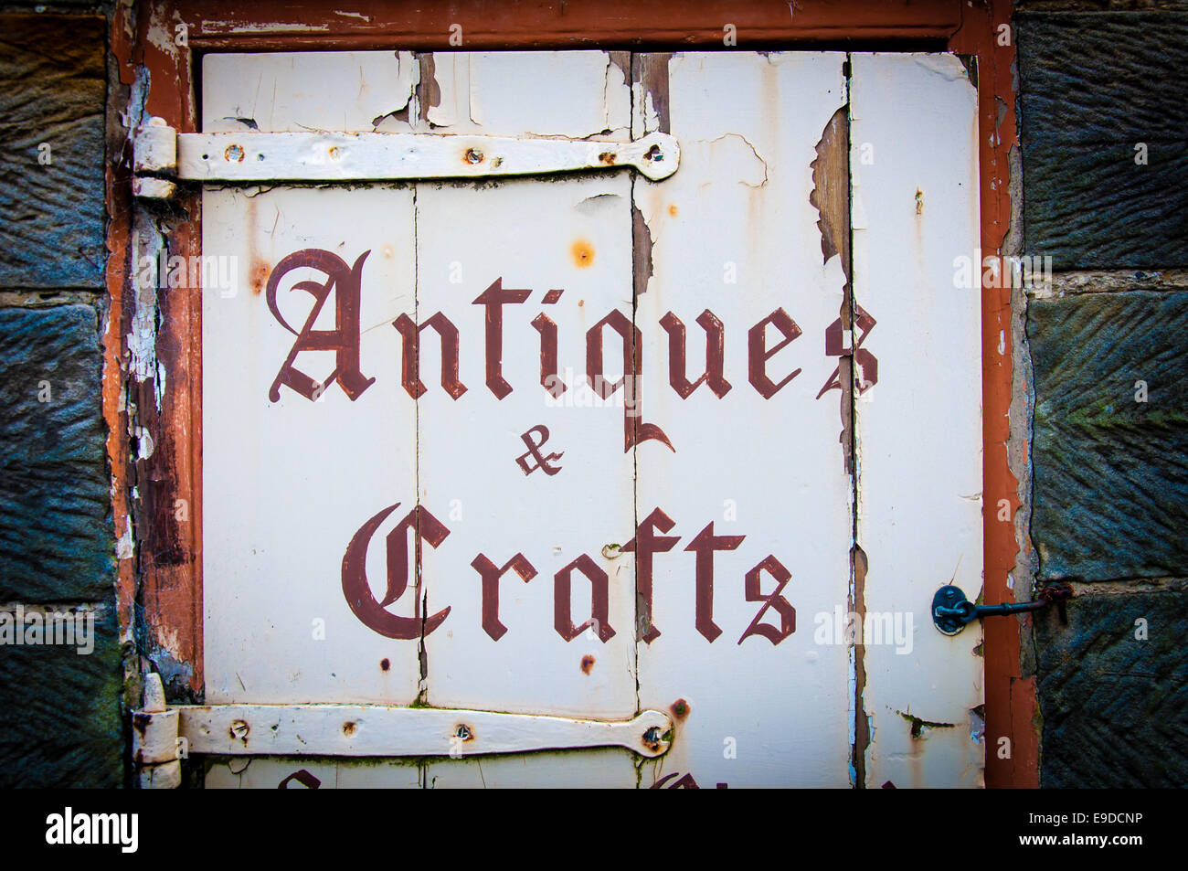 Old wooden Obsolete sign with Antiques and Crafts Stock Photo - Alamy