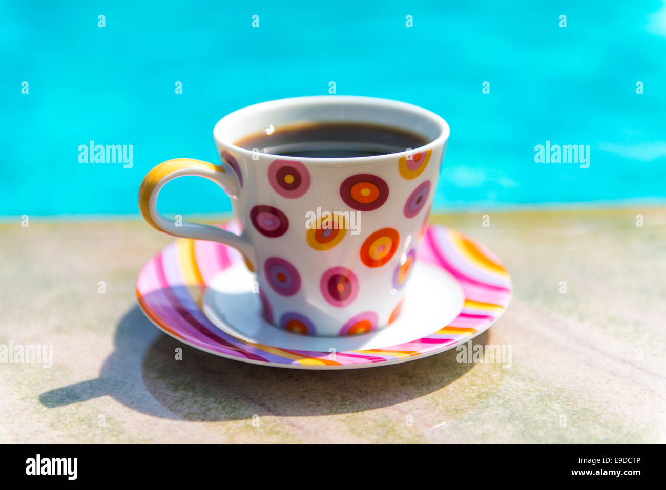 Colorful cup of coffee on the pool Stock Photo - Alamy