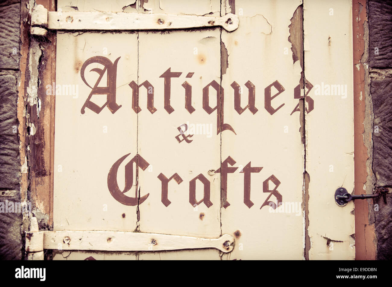 Old wooden Obsolete sign with Antiques and Crafts Stock Photo - Alamy