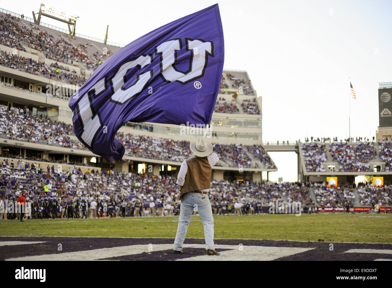A TCU flag bearer celebrates after the Horned Frogs scored a touchdown ...