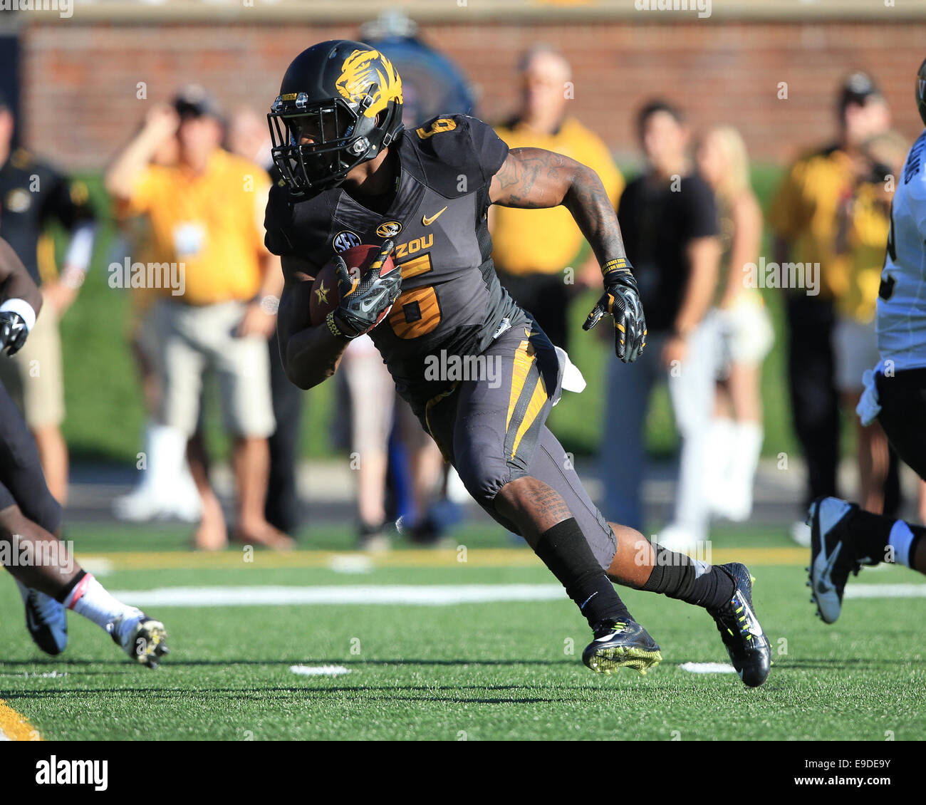October 25, 2014 Columbia, MO: Missouri Tigers running back Marcus Murphy (6) runs the ball ...