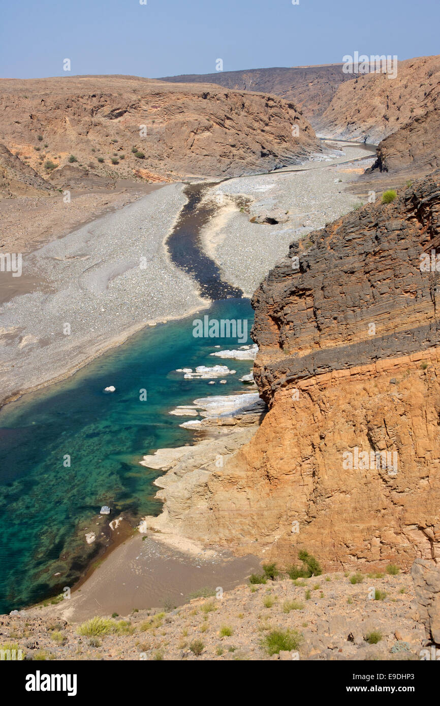 Water has cut through desert rock to create Wadi Dyqah, one of the most ...
