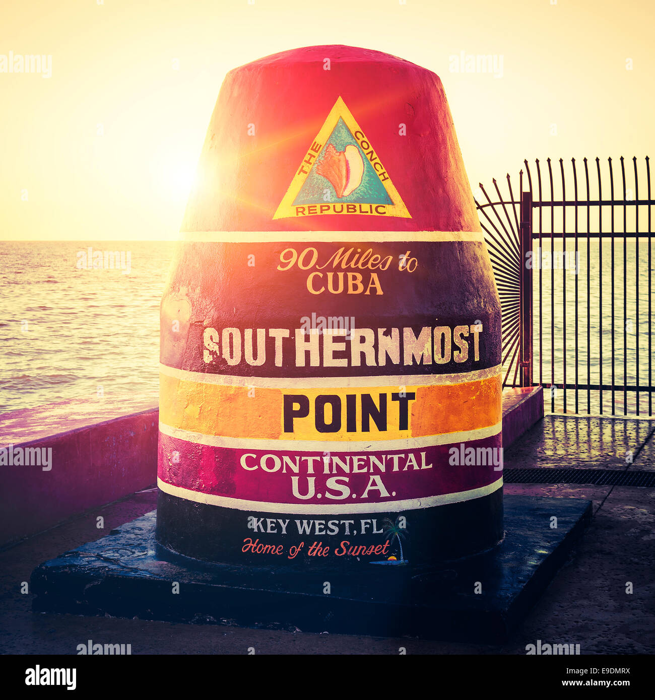 Florida Buoy sign marking the southernmost point at sunset Stock Photo ...