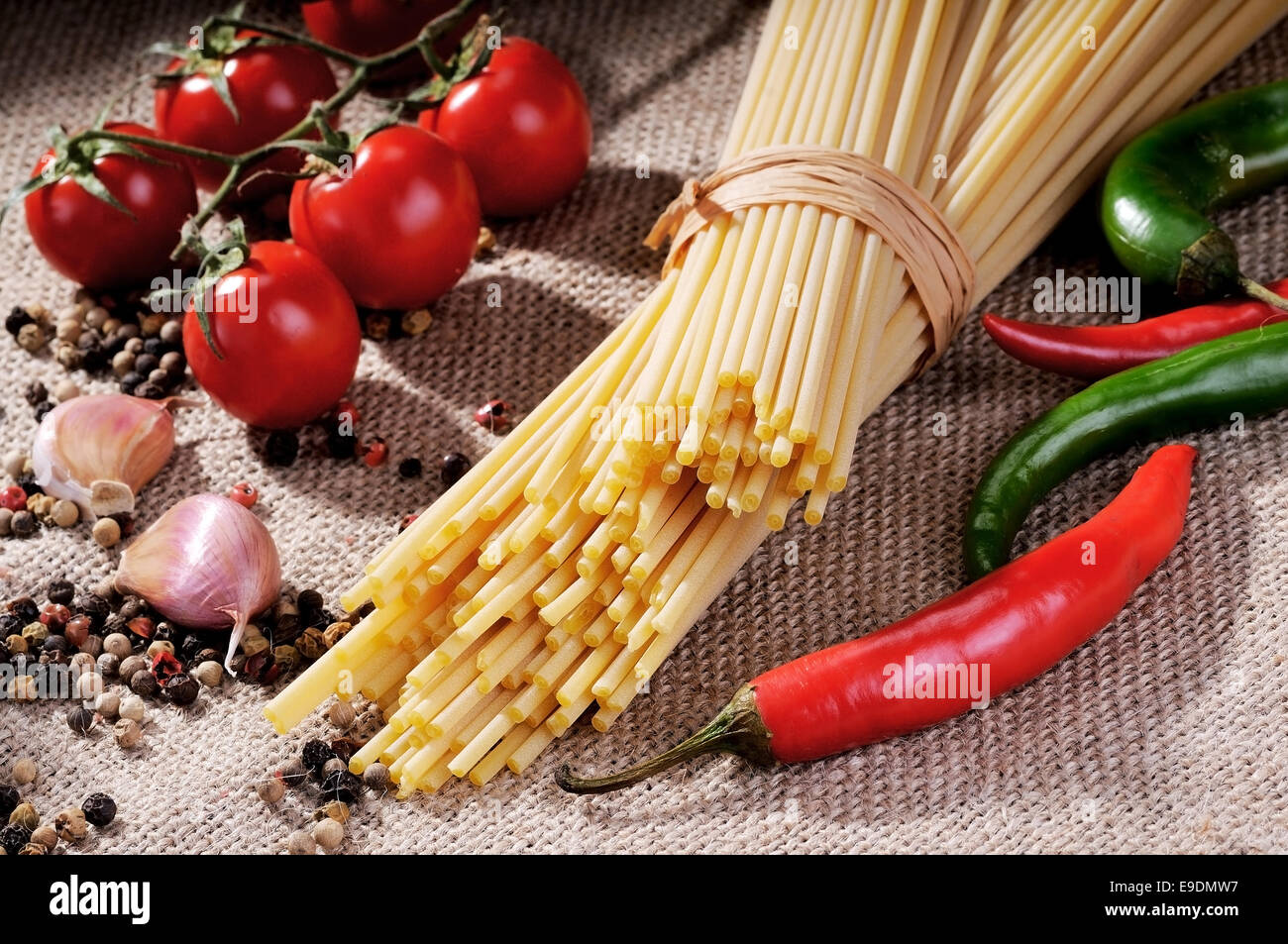 Ingredients for seasoning a dish of spaghetti Stock Photo - Alamy