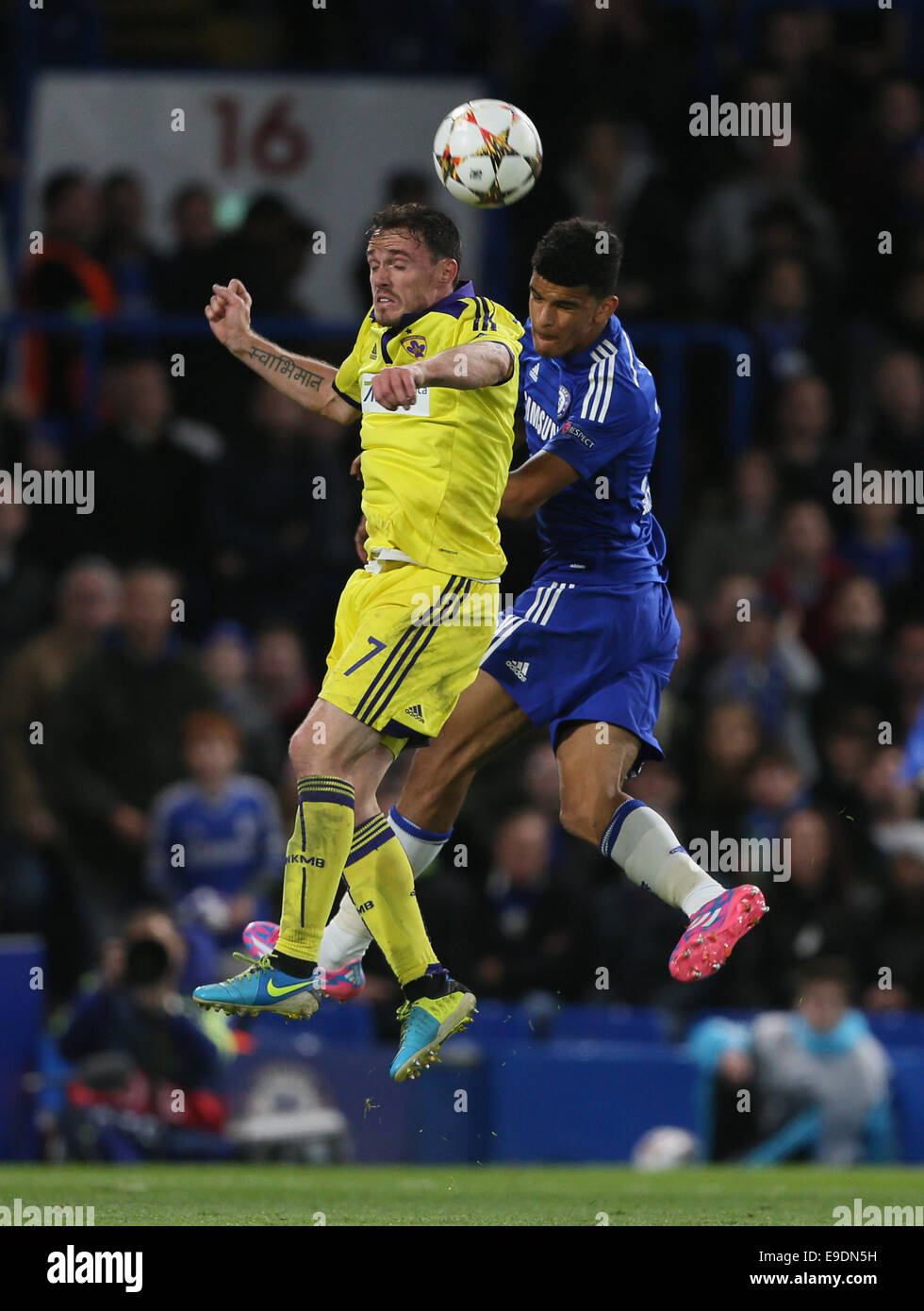 London, UK. 21st Oct, 2014. Chelsea's Dominic Solanke tussles with ...