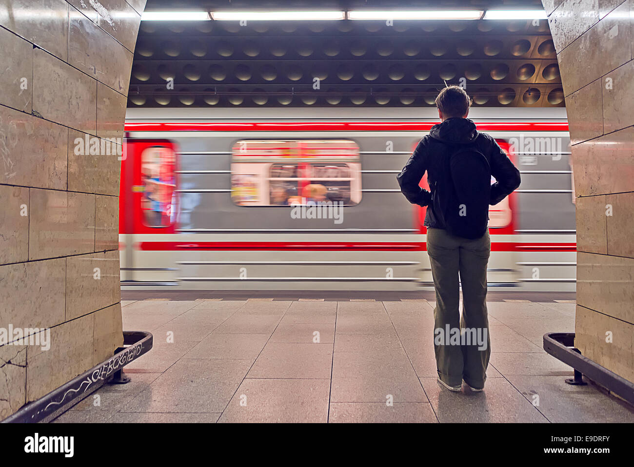 Woman waiting for subway hi-res stock photography and images - Alamy