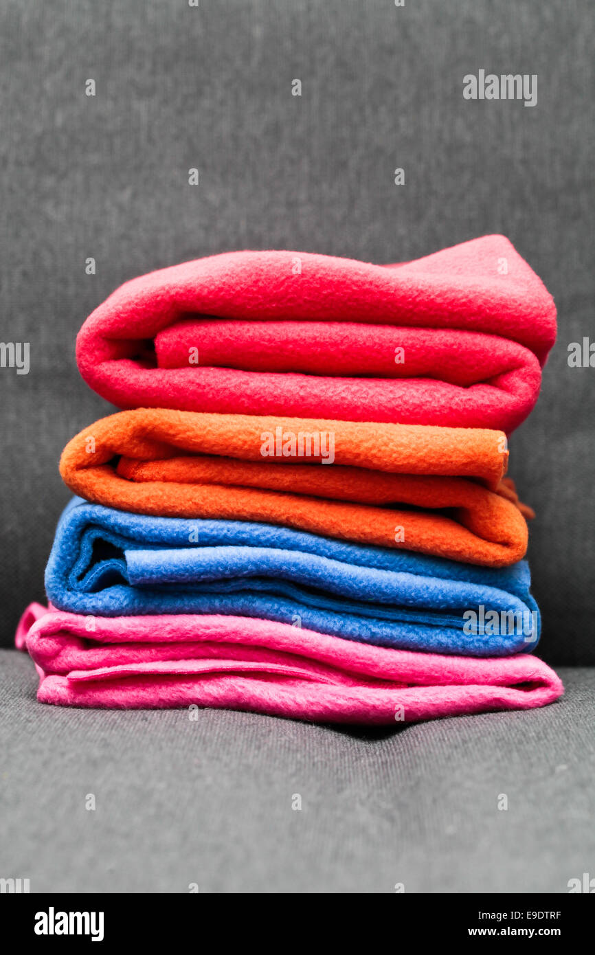 Stack of colorful fleece cloths Stock Photo - Alamy