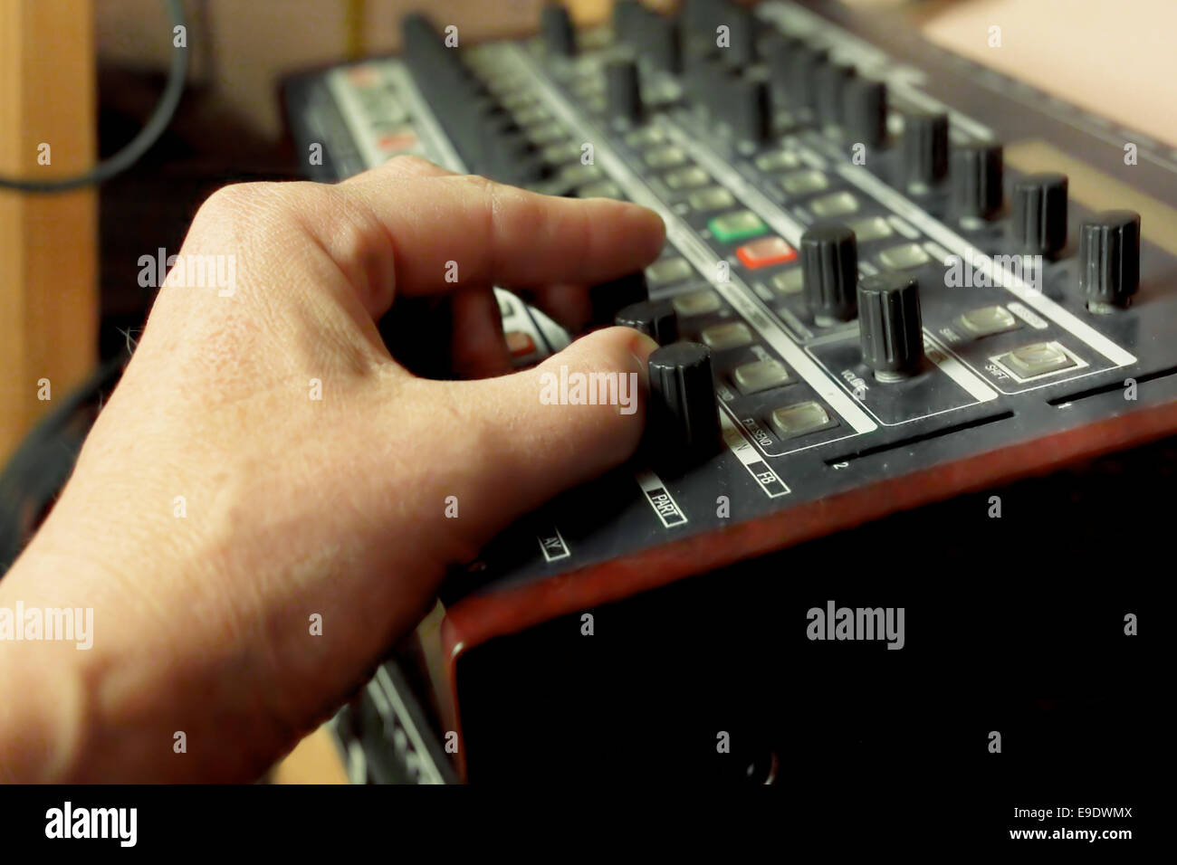 Composer hand creating a tune Stock Photo - Alamy