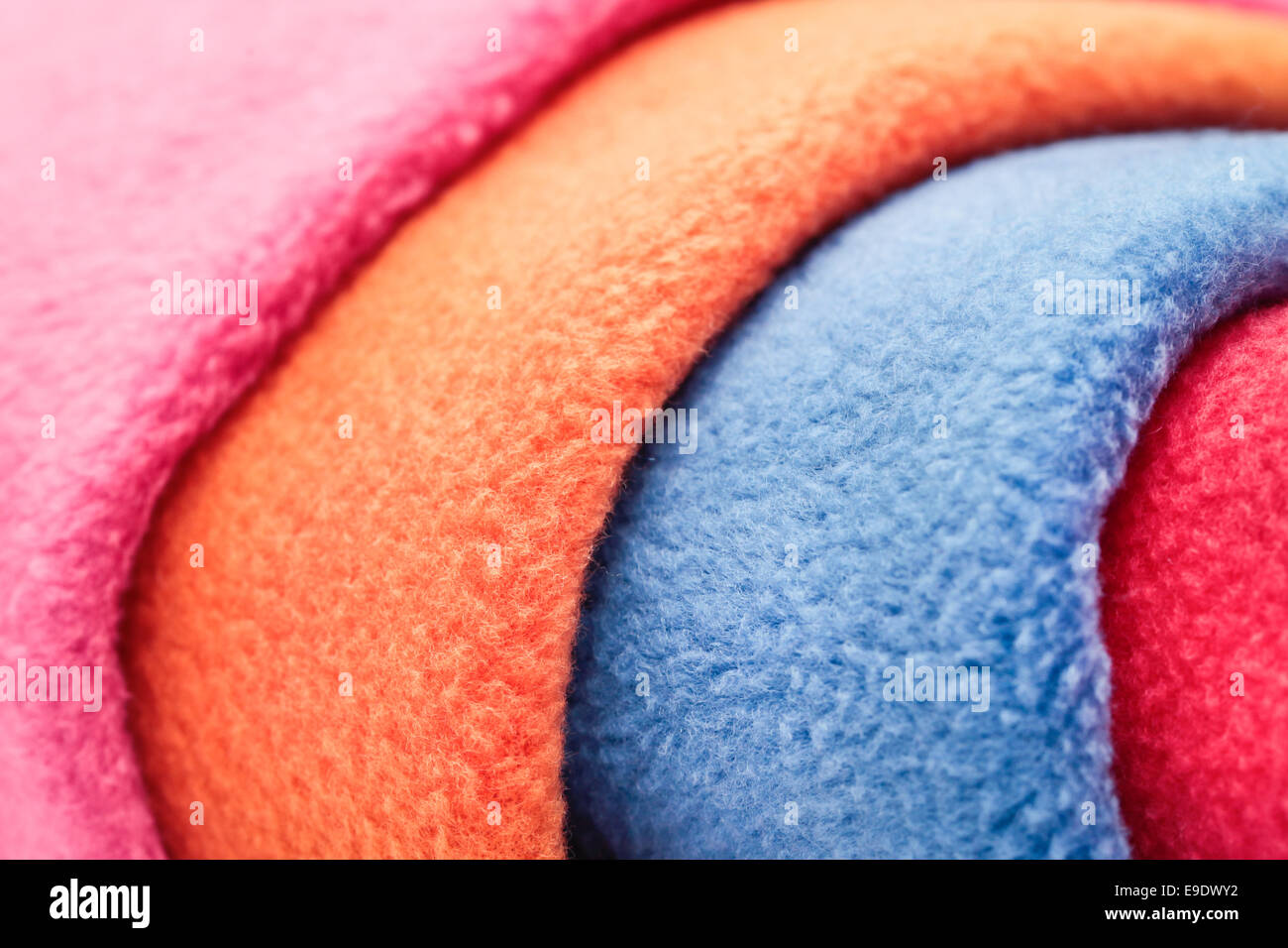 Stack of colorful fleece cloths Stock Photo - Alamy