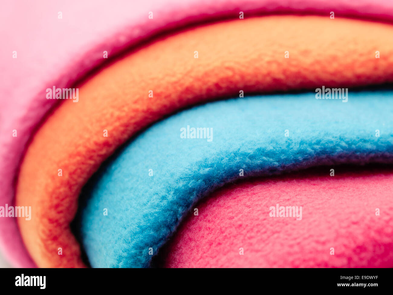 Stack of colorful fleece cloths Stock Photo - Alamy