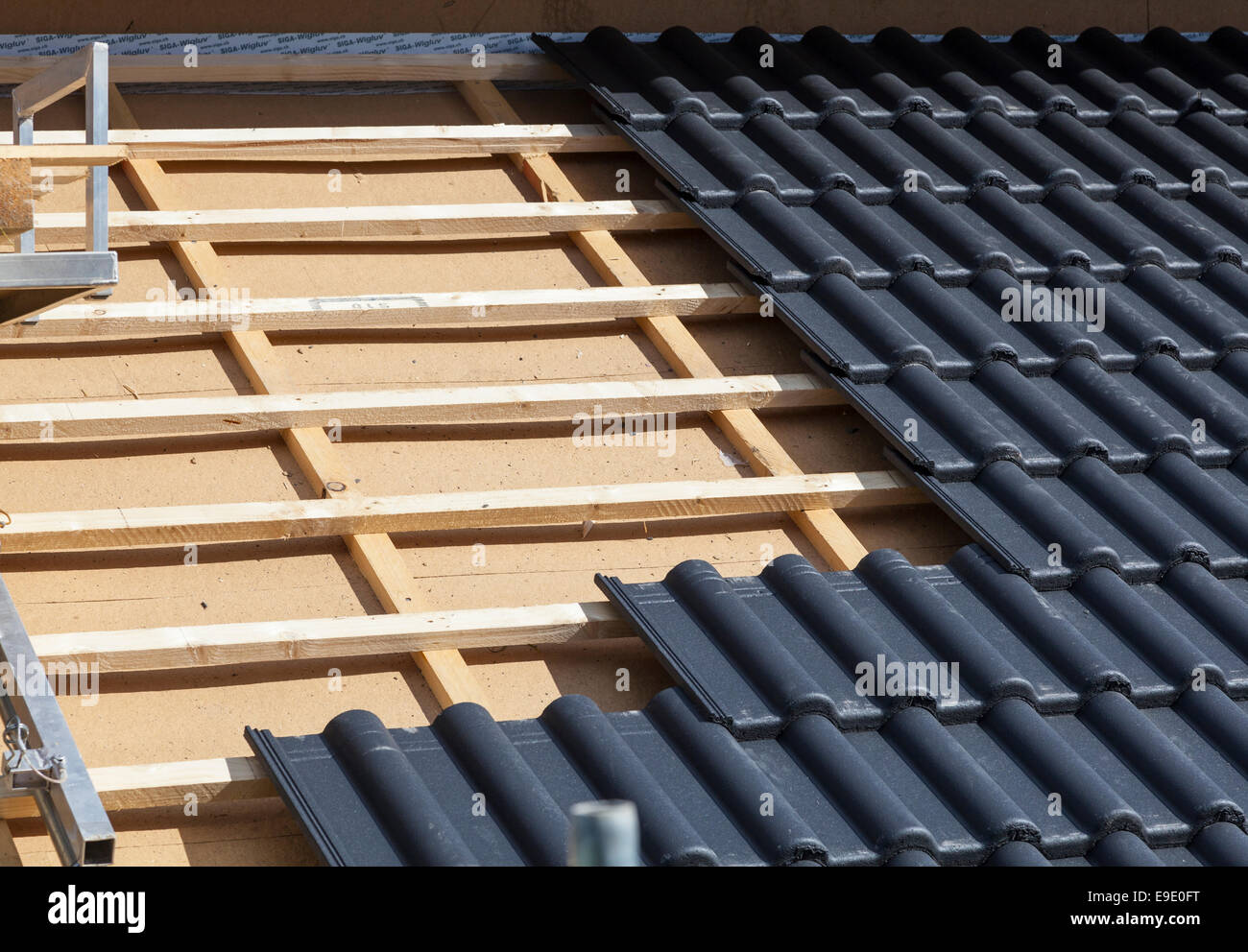 Roofing tiles hi-res stock photography and images - Alamy
