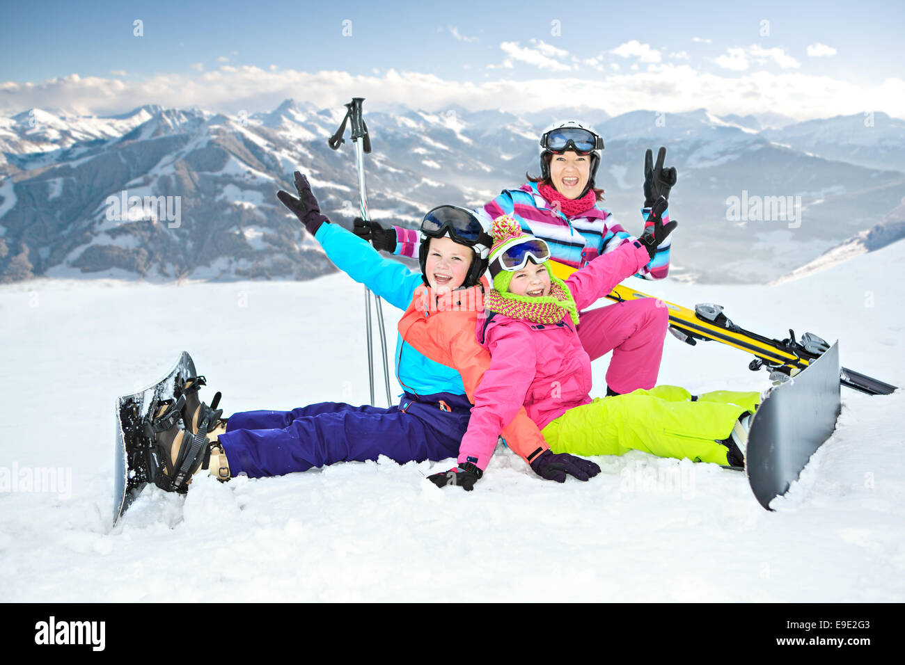 teenage girls snowboarding in the Alps Stock Photo - Alamy