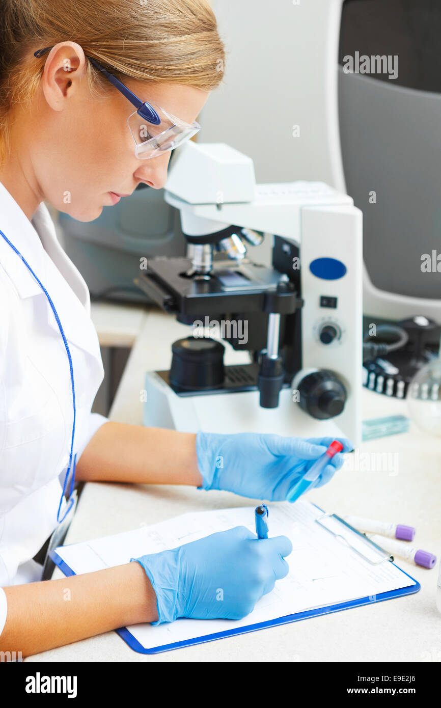 Laboratory woman microscope hi-res stock photography and images - Alamy