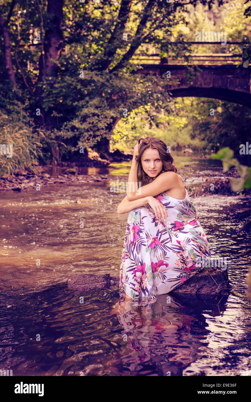 portrait of a young woman in a river Stock Photo - Alamy