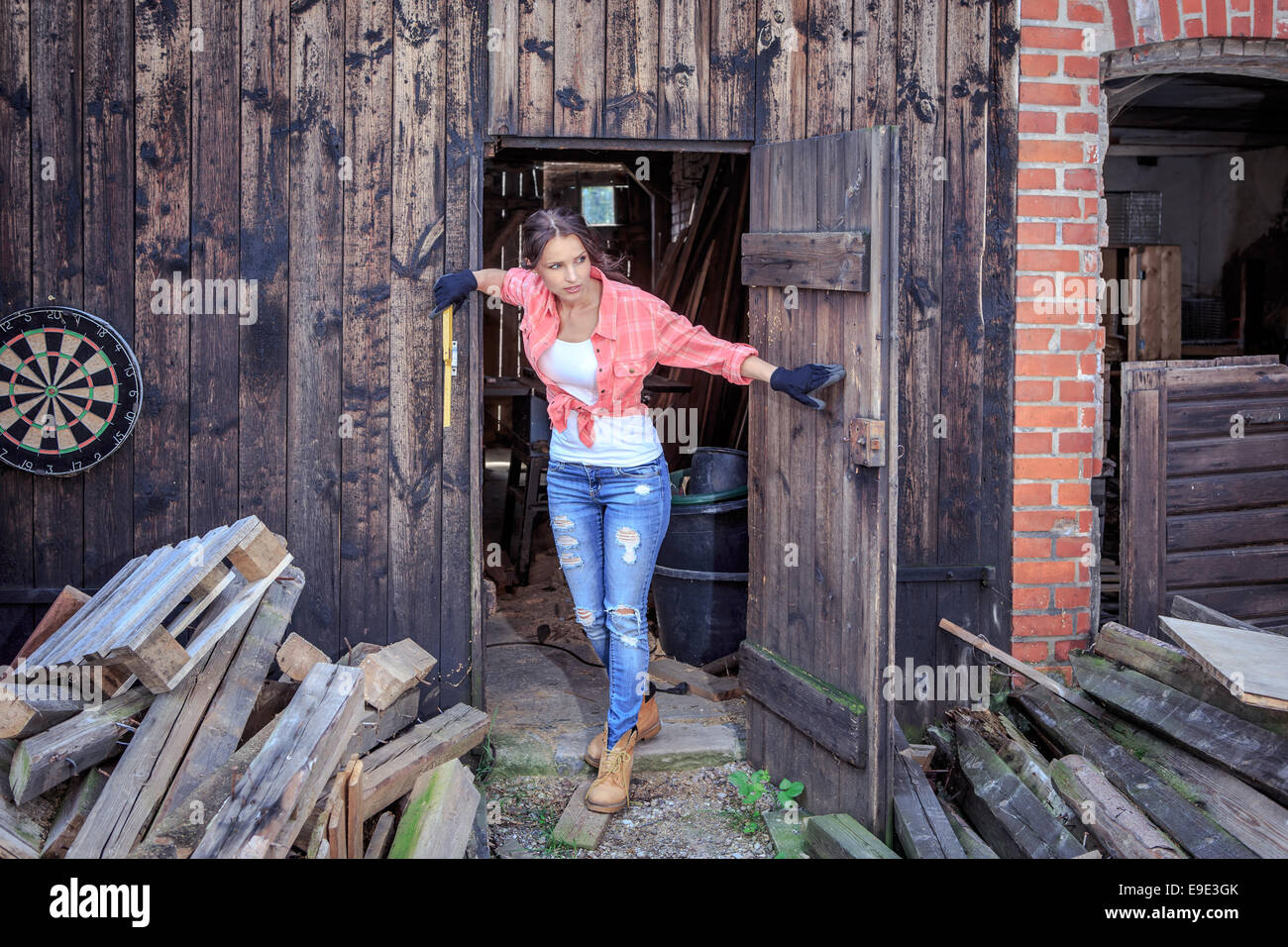 portrait of a young woman in the old barn Stock Photo - Alamy