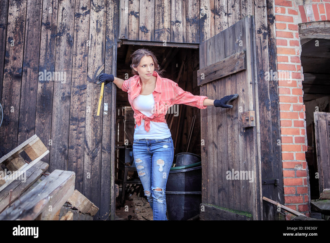 portrait of a young woman in the old barn Stock Photo - Alamy