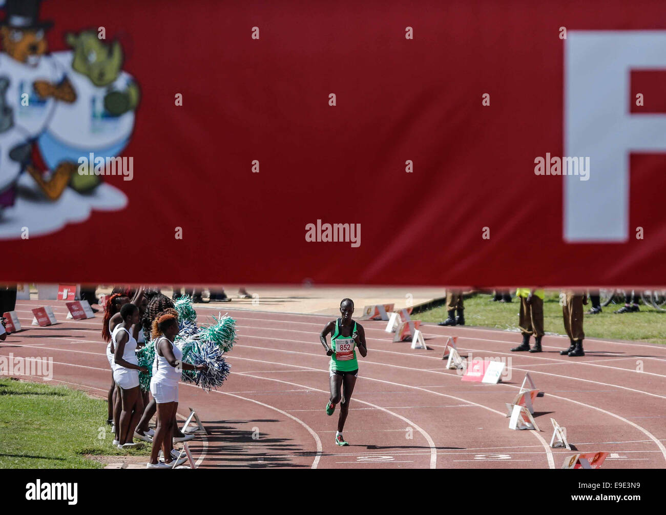 Nairobi, Kenya. 26th Oct, 2014. Irene Kipchumba of Kenya rushes to the finishing line during the ...