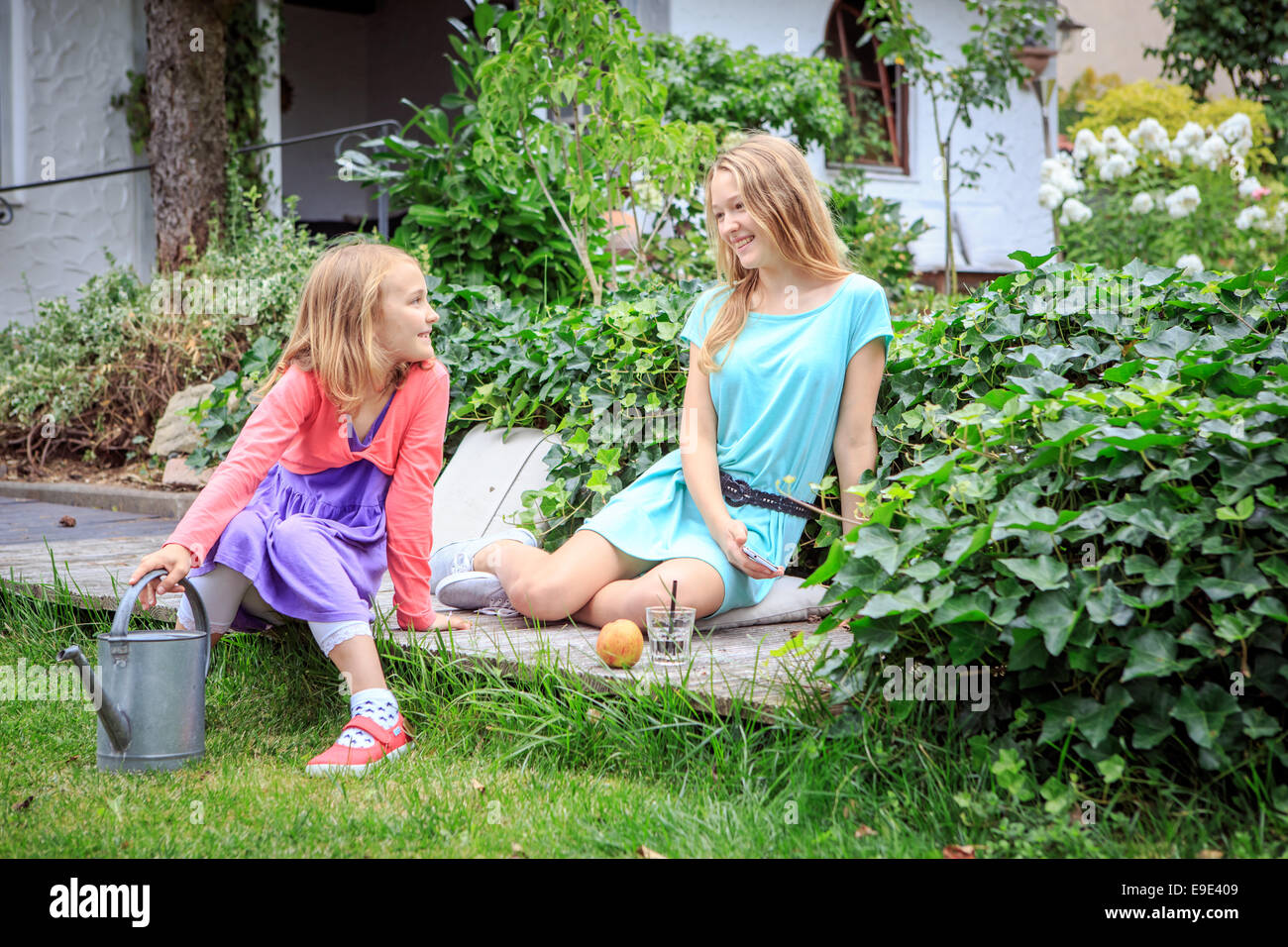portrait of a teenager girl in the backyard Stock Photo - Alamy