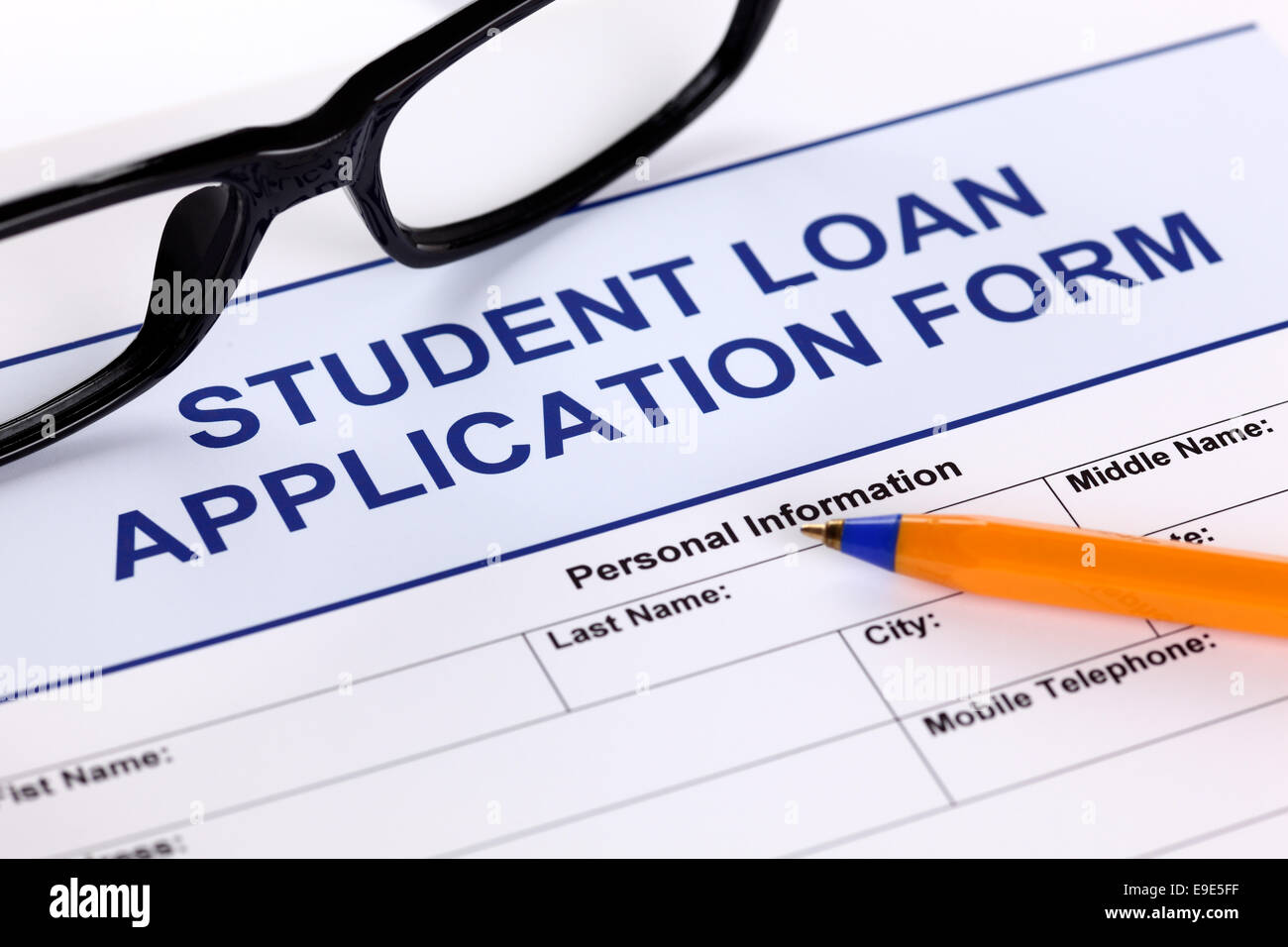 Student Loan Application form with glasses and ballpoint pen Stock ...