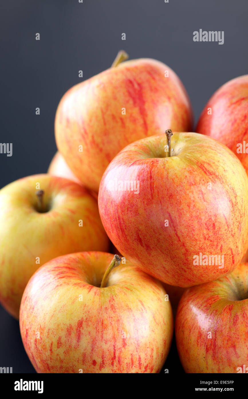 Heap of fresh organic apples on black background Stock Photo - Alamy