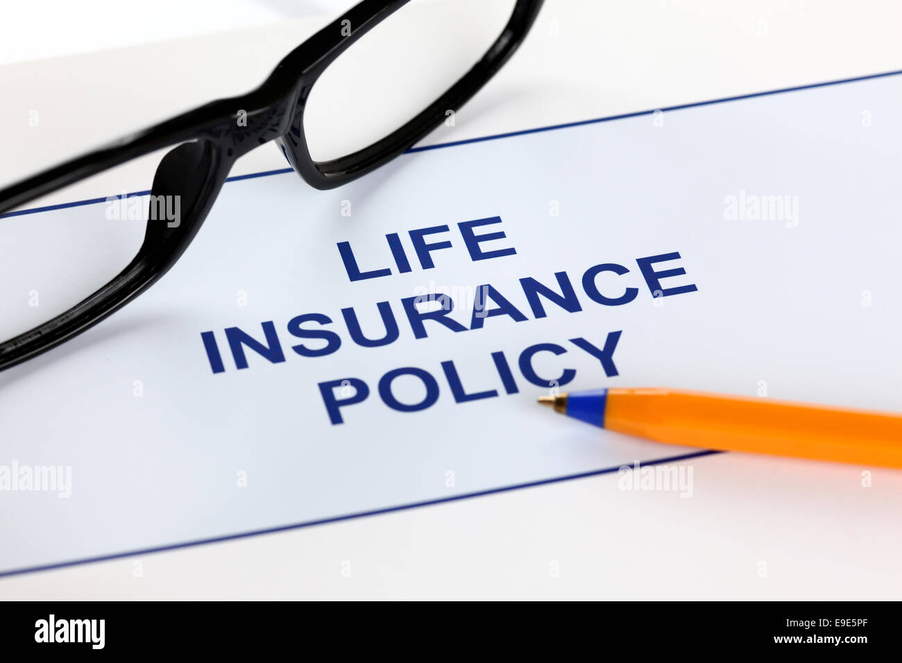 Life insurance policy with glasses and ballpoint pen Stock Photo - Alamy