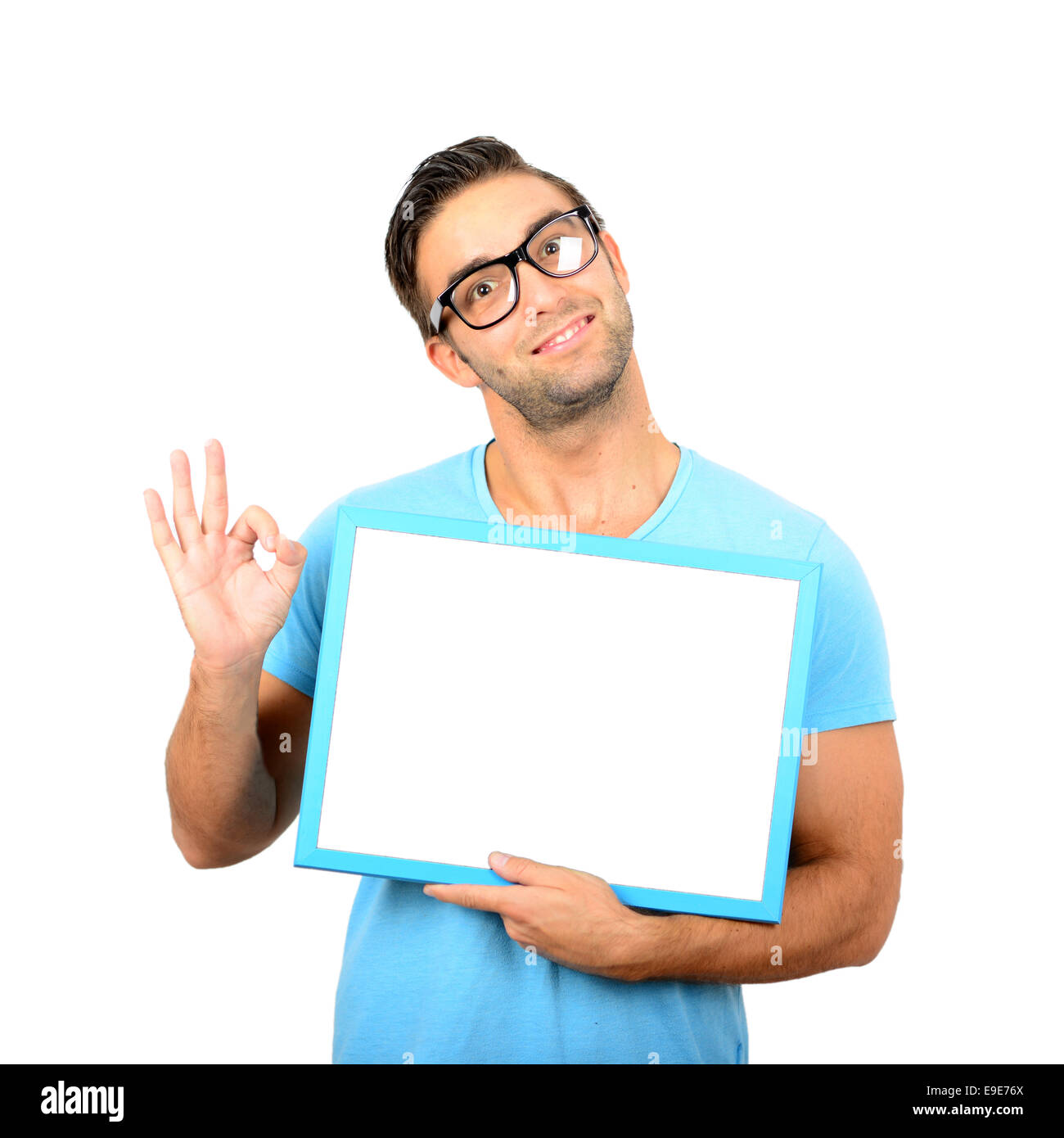 Happy young man showing and displaying placard ready for your text or ...