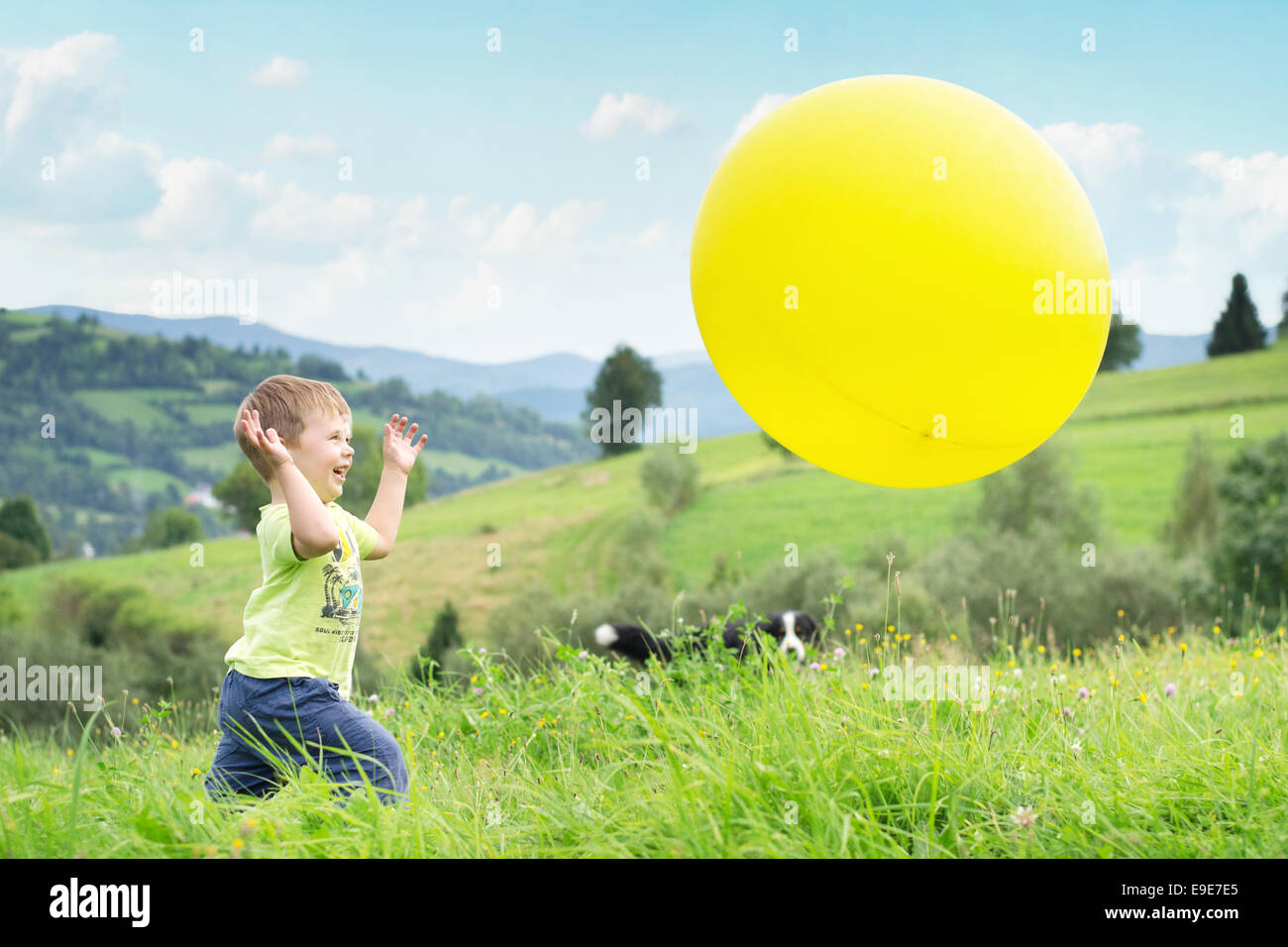 Boy chasing balloon hi-res stock photography and images - Alamy