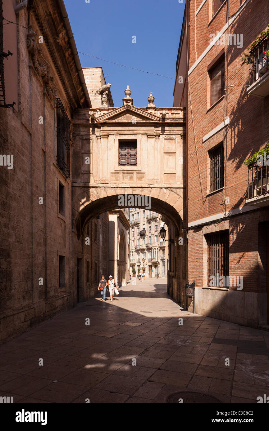 One of the small side streets surrounding the basilica in Valencia ...