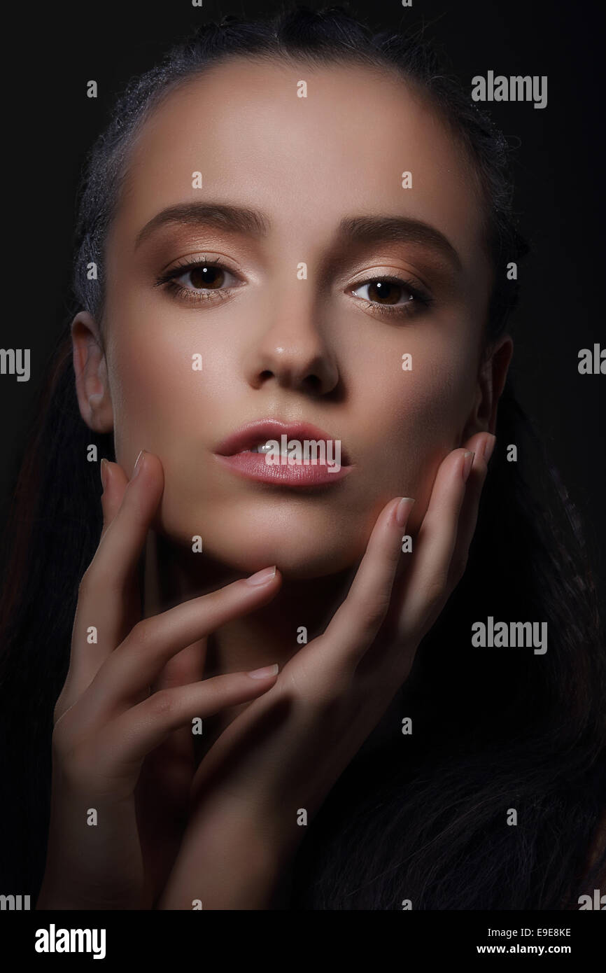 Sentiment. Affectionate Woman Touching Her Face Stock Photo - Alamy