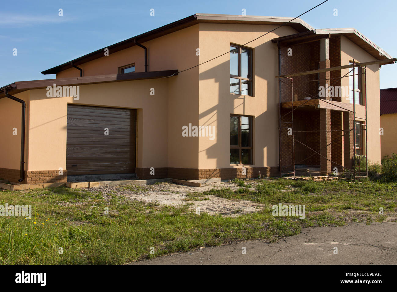 Real Estate Architectural Exterior House Building Design on Grassy ...