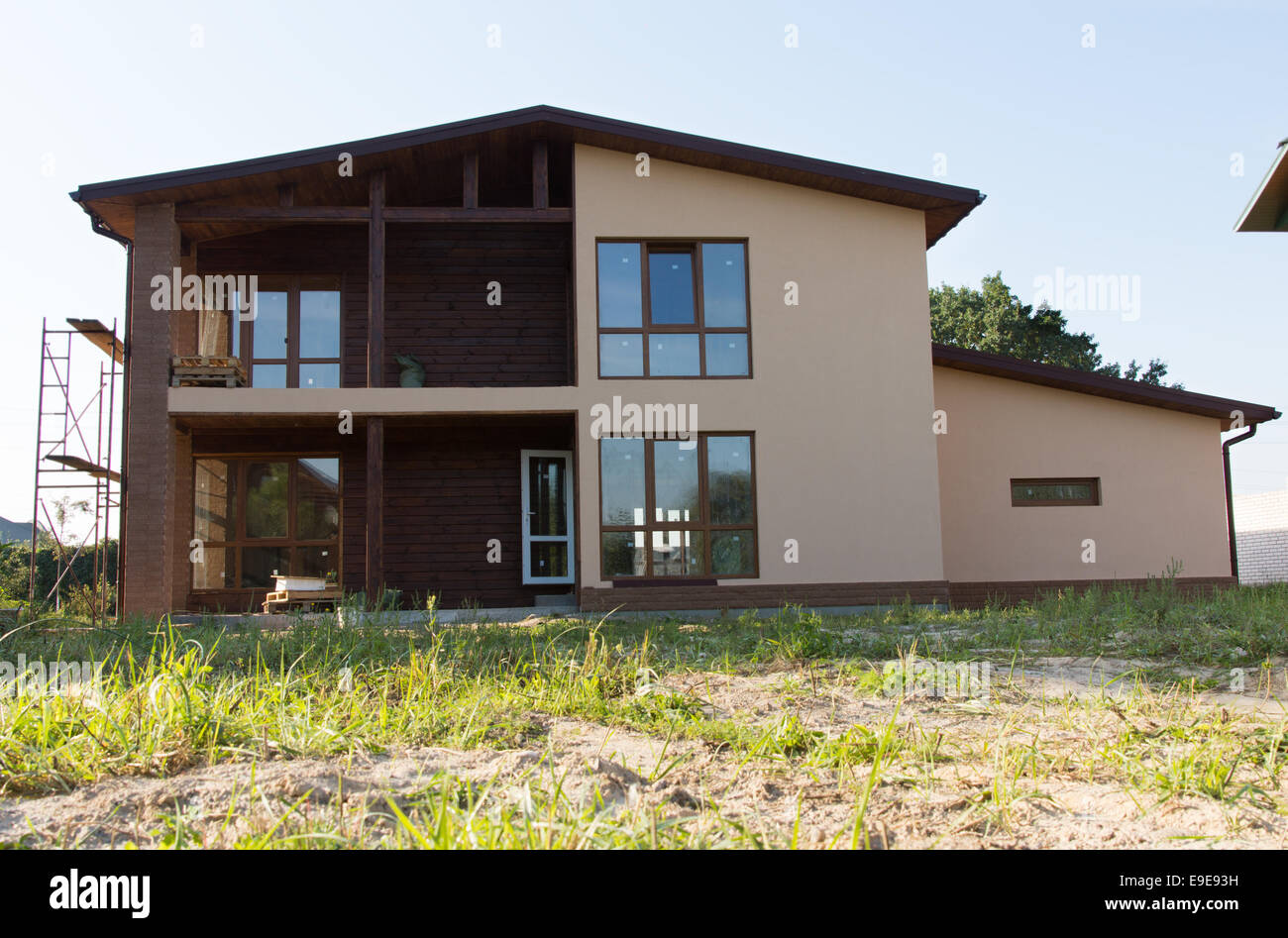 Unfinished Architectural Brown Real Estate Building Design on Grassy ...