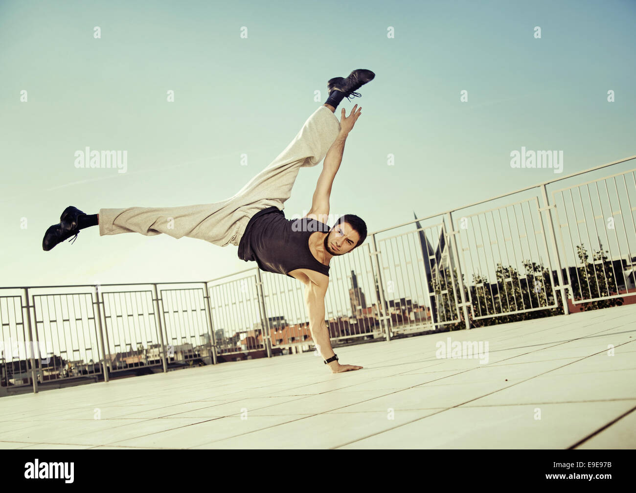 Strong guy doing hard exercises Stock Photo - Alamy