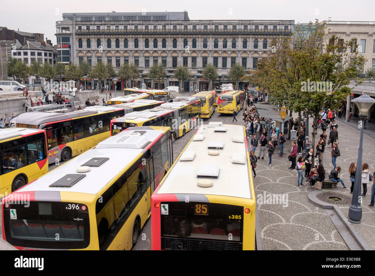 Buses in busy central bus station in Place Saint Lambert, Liege ...
