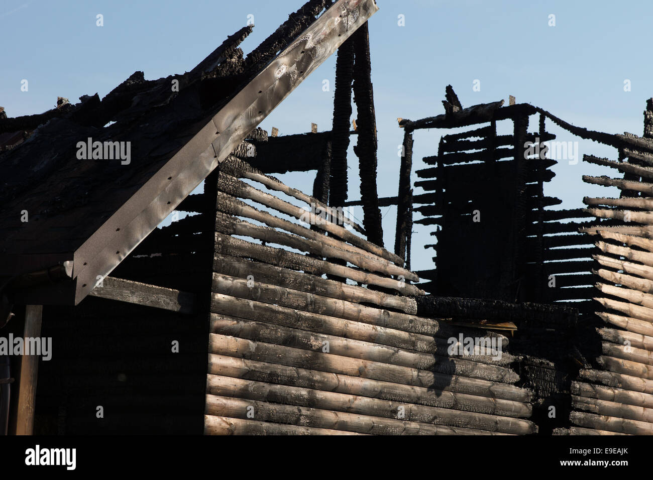 Close up Extensive Fire Damaged Wooden House, Emphasizing the Peak Part ...