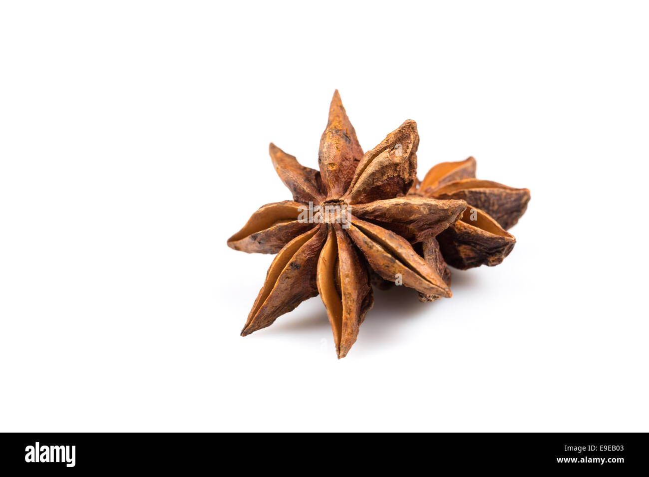 Stars of anise isolated on white background Stock Photo - Alamy