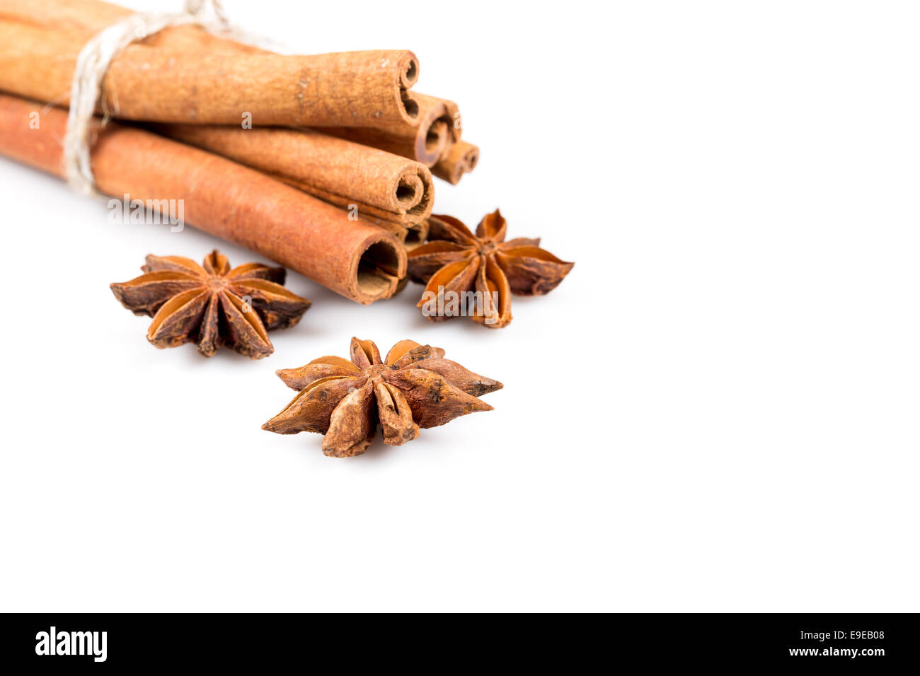 Stars of anise and cinnamon on white background Stock Photo - Alamy