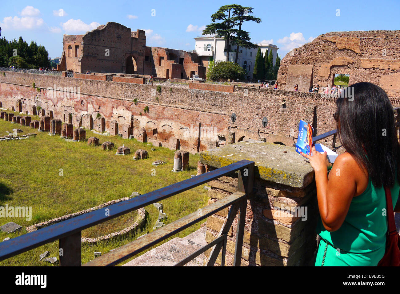 Palantine Hill, Rome, Italy. Tourist with guide book overlooking the ...