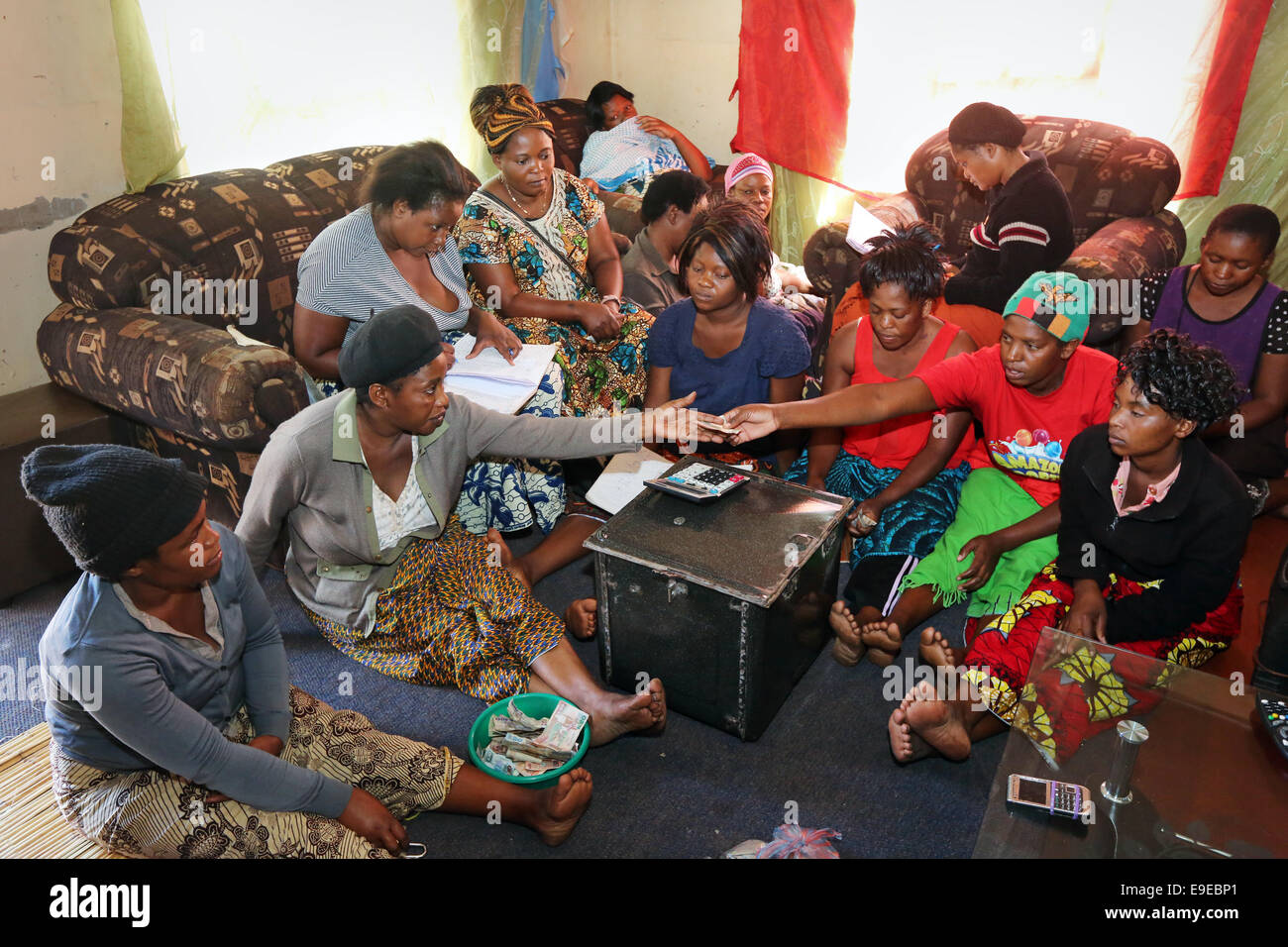 Women of a loan-self-help group, meeting of a saving and lending ...