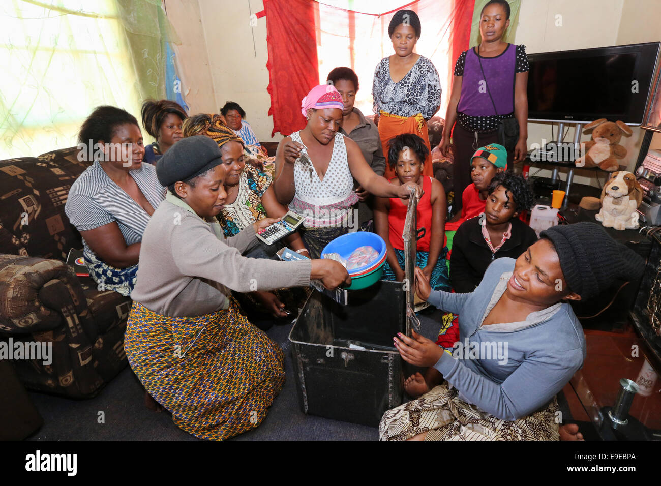 Women of a loan-self-help group, meeting of a saving and lending ...